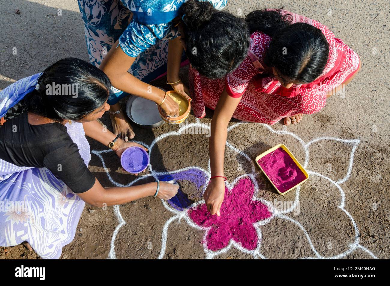 Rangoli are decorative sanddesigns made on floors of living rooms and ...
