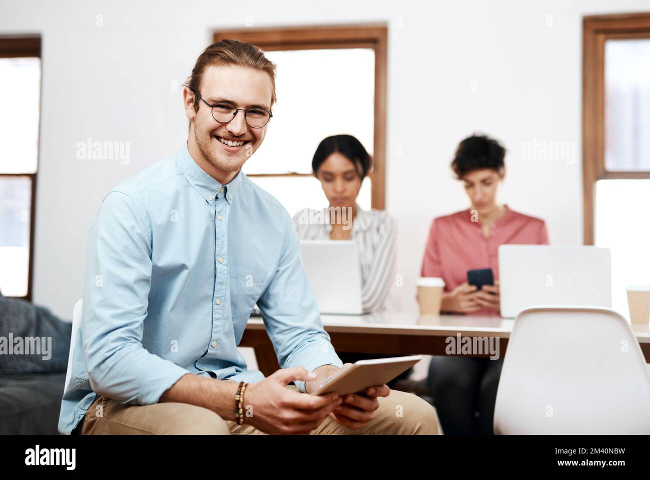This team gets things done. Cropped portrait of a handsome young ...