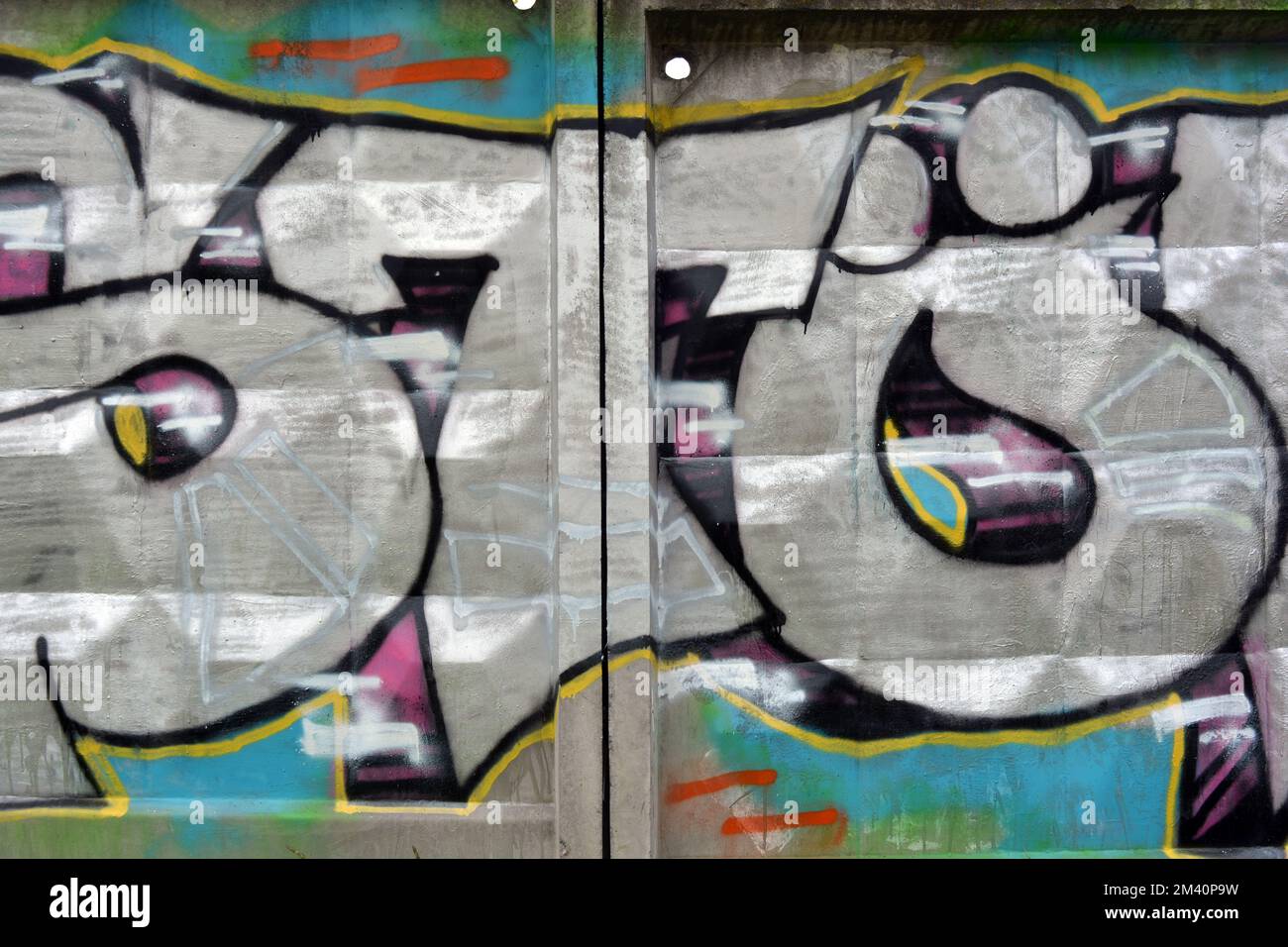 Graffiti word ASTOR, drawn by a lapdog in voluminous grey, white ...