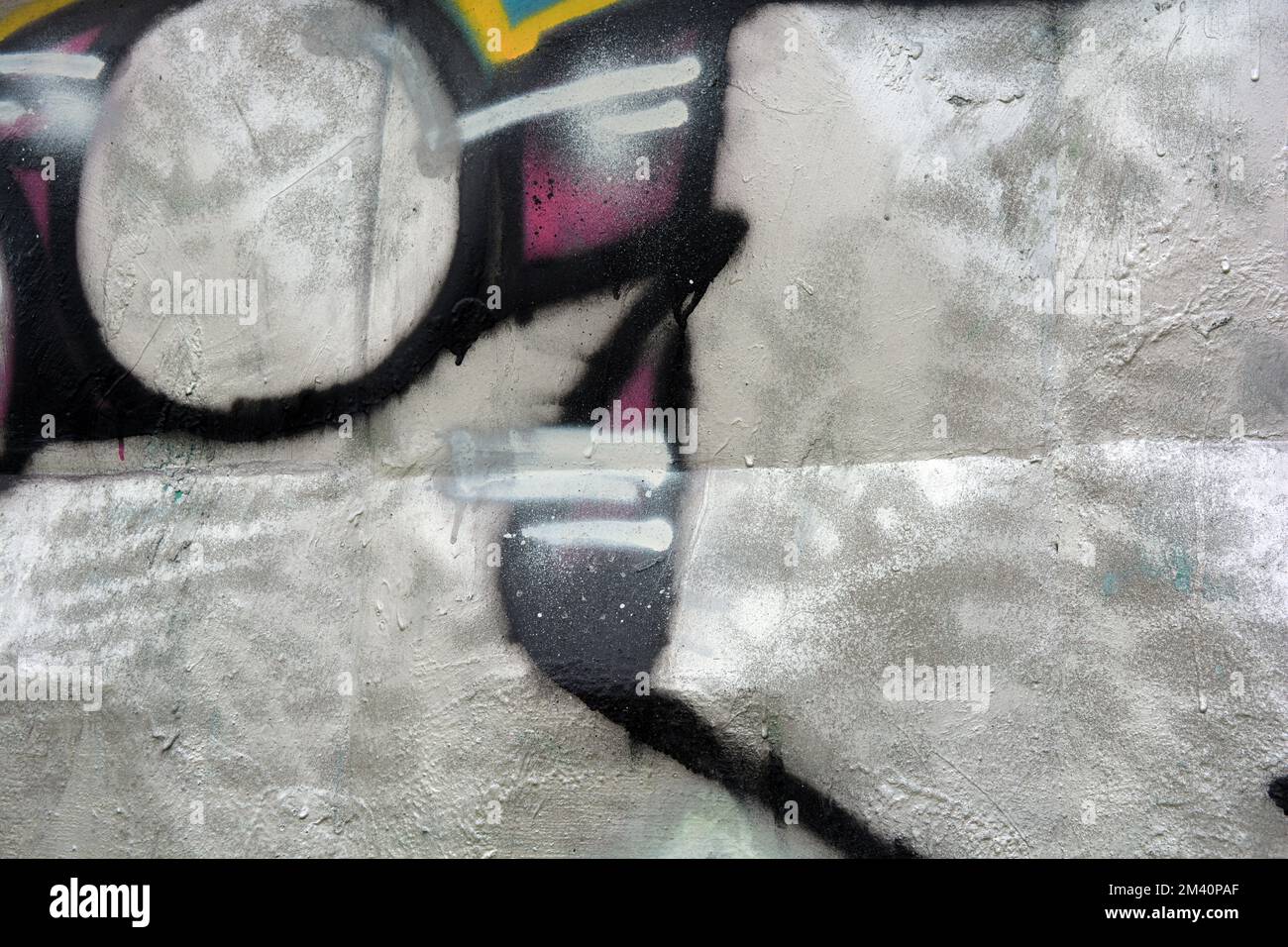 Graffiti word ASTOR, drawn by a lapdog in voluminous grey, white ...