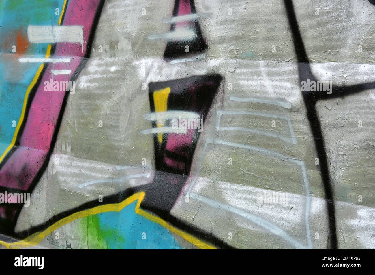 Graffiti word ASTOR, drawn by a lapdog in voluminous grey, white ...