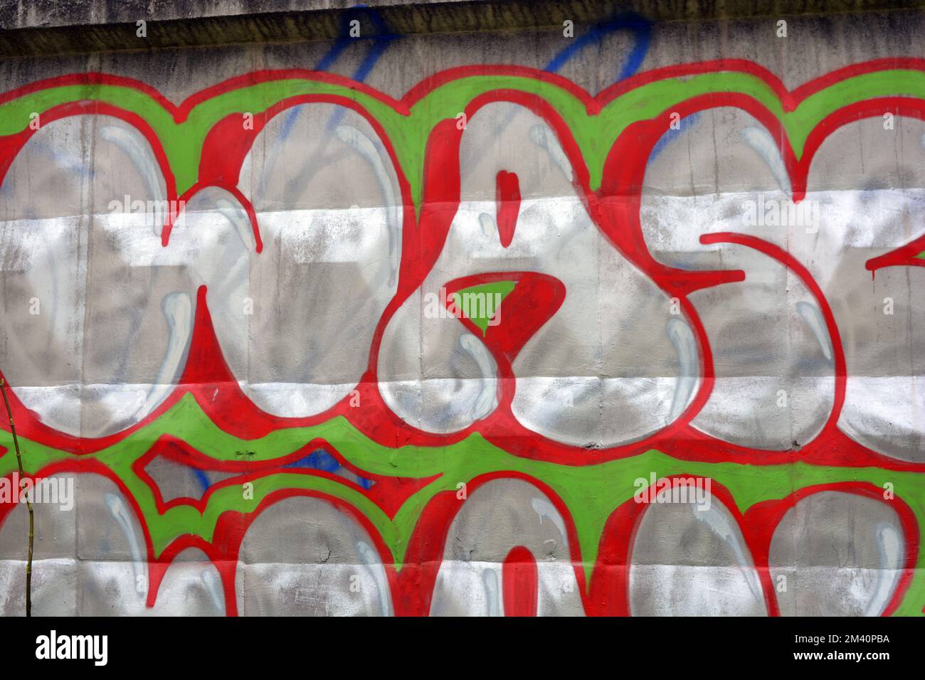 Graffiti word WANN, drawn by a lapdog in grey, red, green letters with ...