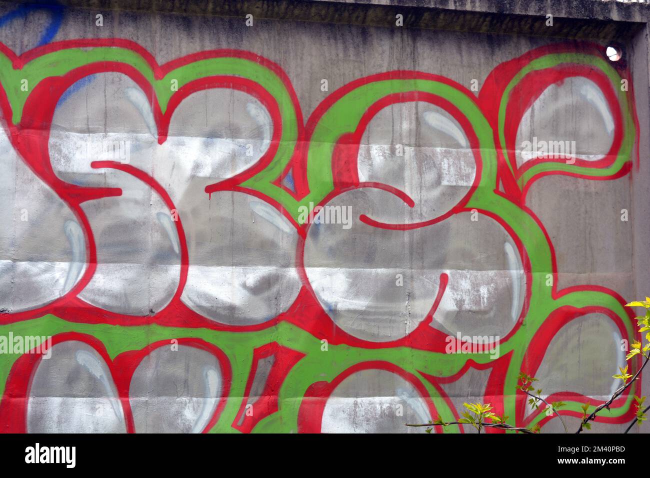 Graffiti word WANN, drawn by a lapdog in grey, red, green letters with ...