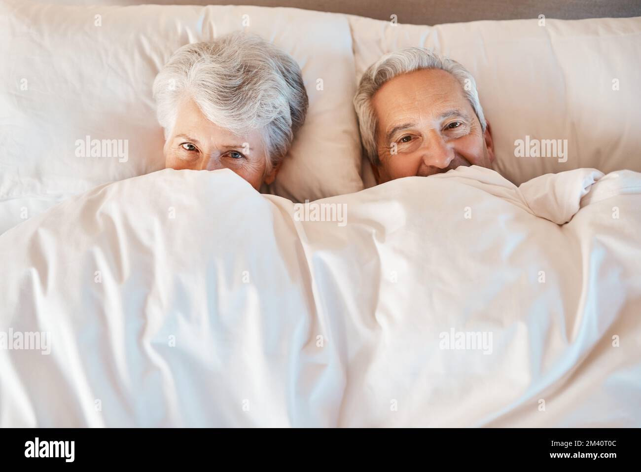 Old couple bed covers hi-res stock photography and images - Alamy