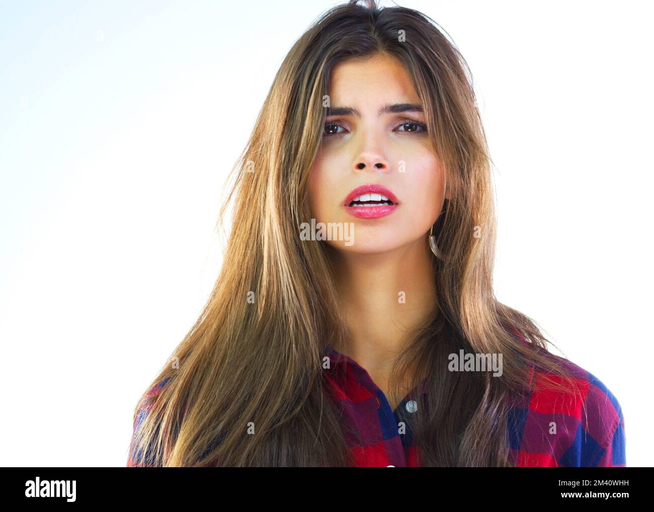 Im just a hot mess. a young woman posing against a white background ...