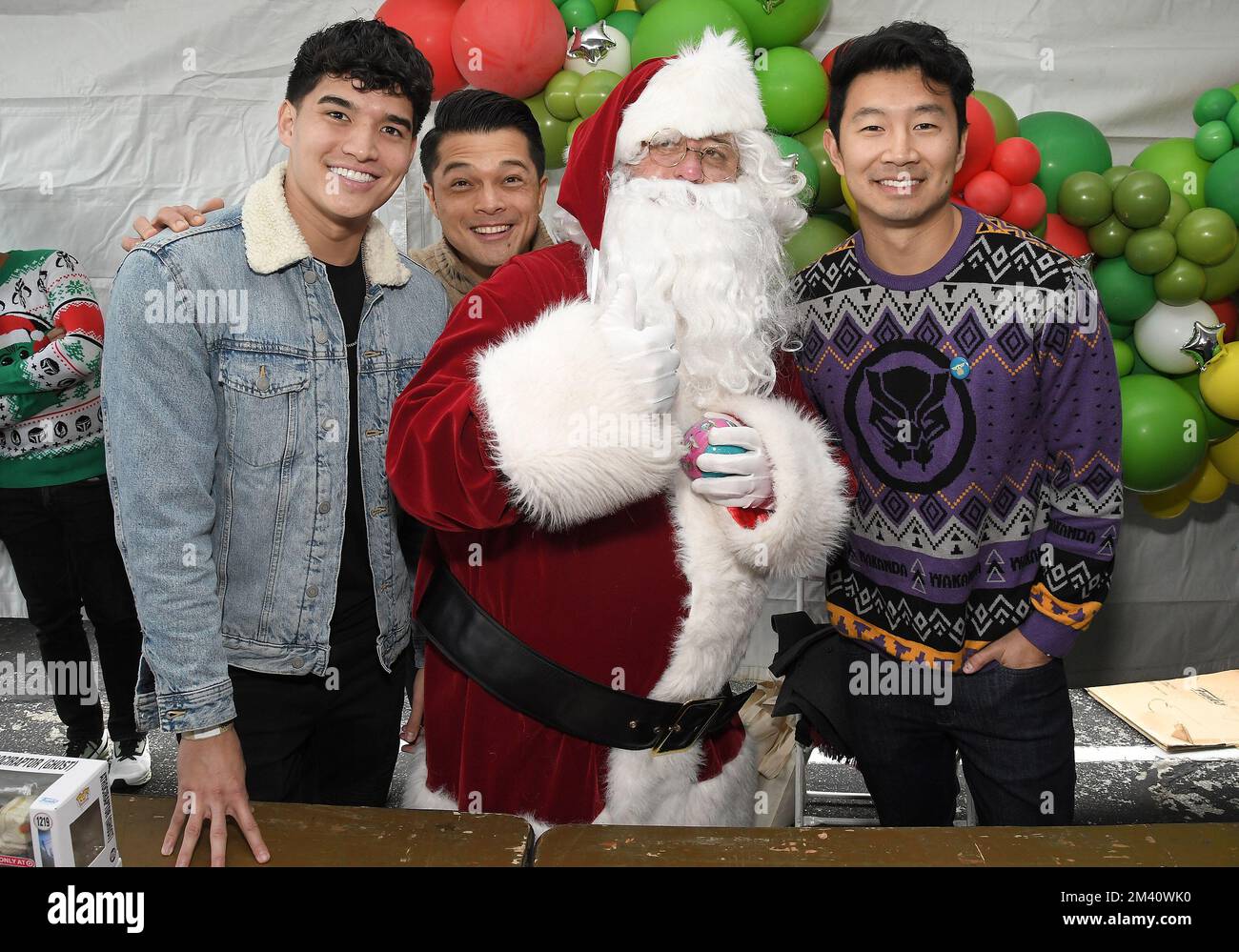 (L-R) Alex Wassabi, Vincent Rodriguez III, Santa Clause and Simu Liu at ...