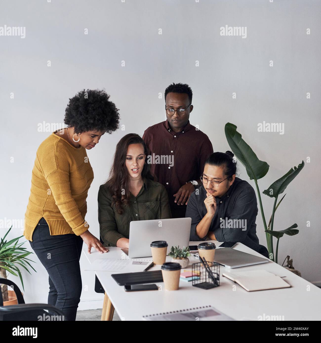 Teamwork divides tasks and multiplies success. a diverse group of ...