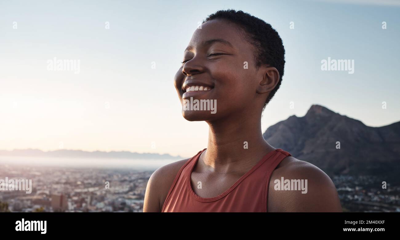 Black woman, fitness and smile for mountain hiking, workout or exercise ...