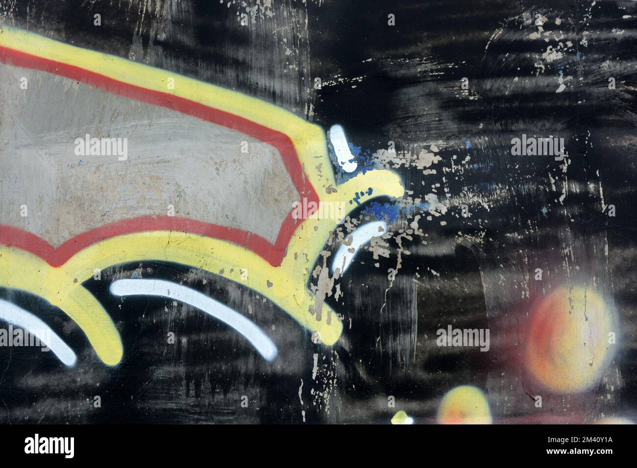 Black, gray letters with red, yellow, and orange spheres, thick lines ...