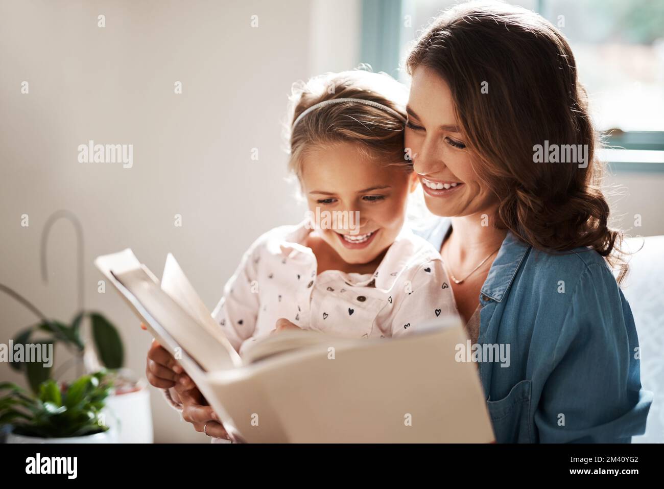 Theres so much to learn from books. an adorable little girl reading a ...