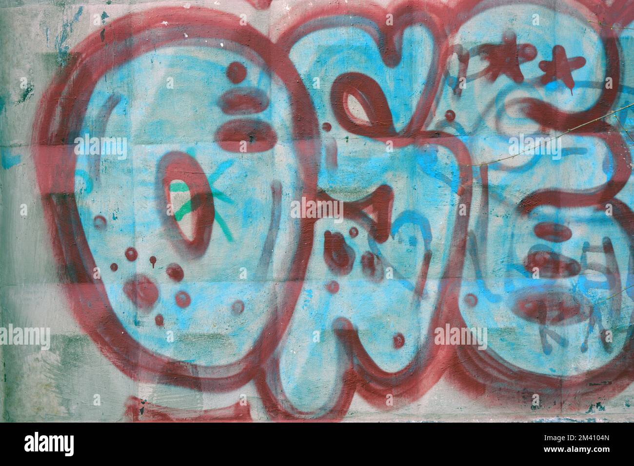 White, blue letters with red dashes, dots, circles, and lines with ...