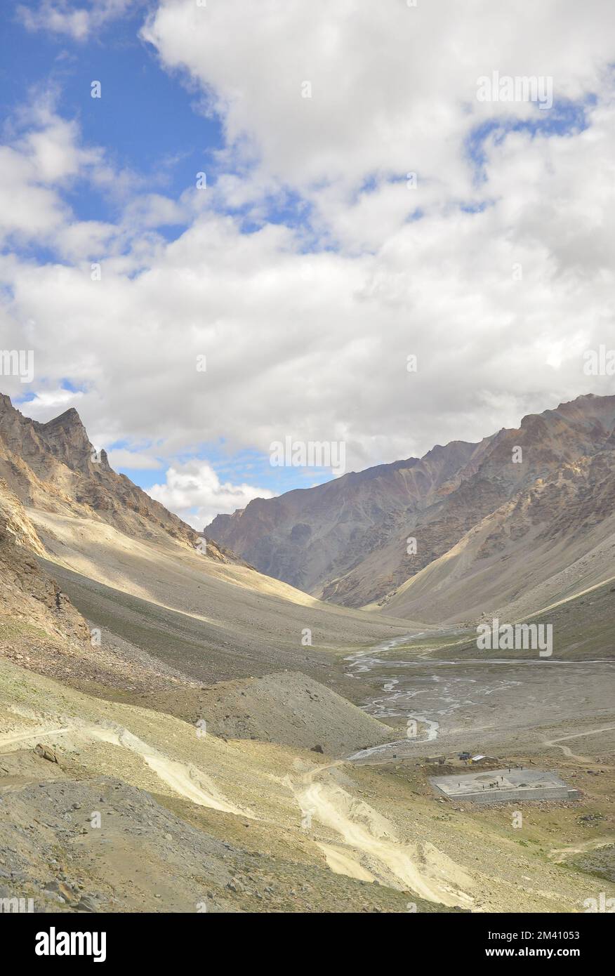 Landscape view of flowing river in between dry mountains in Darcha ...