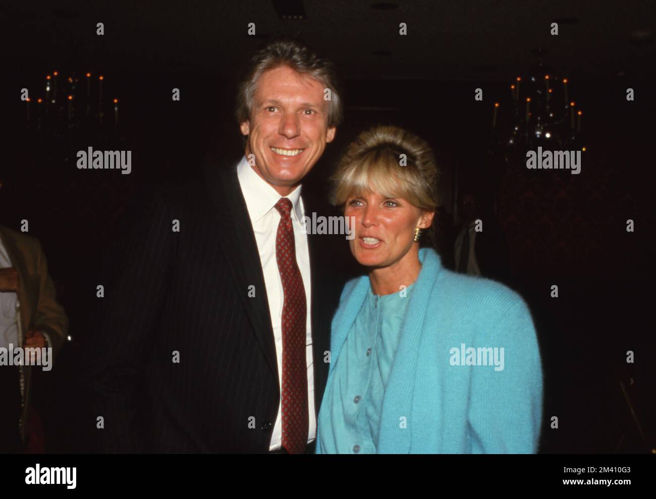 Norman Miller and Linda Evans at the American Women in Radio and ...