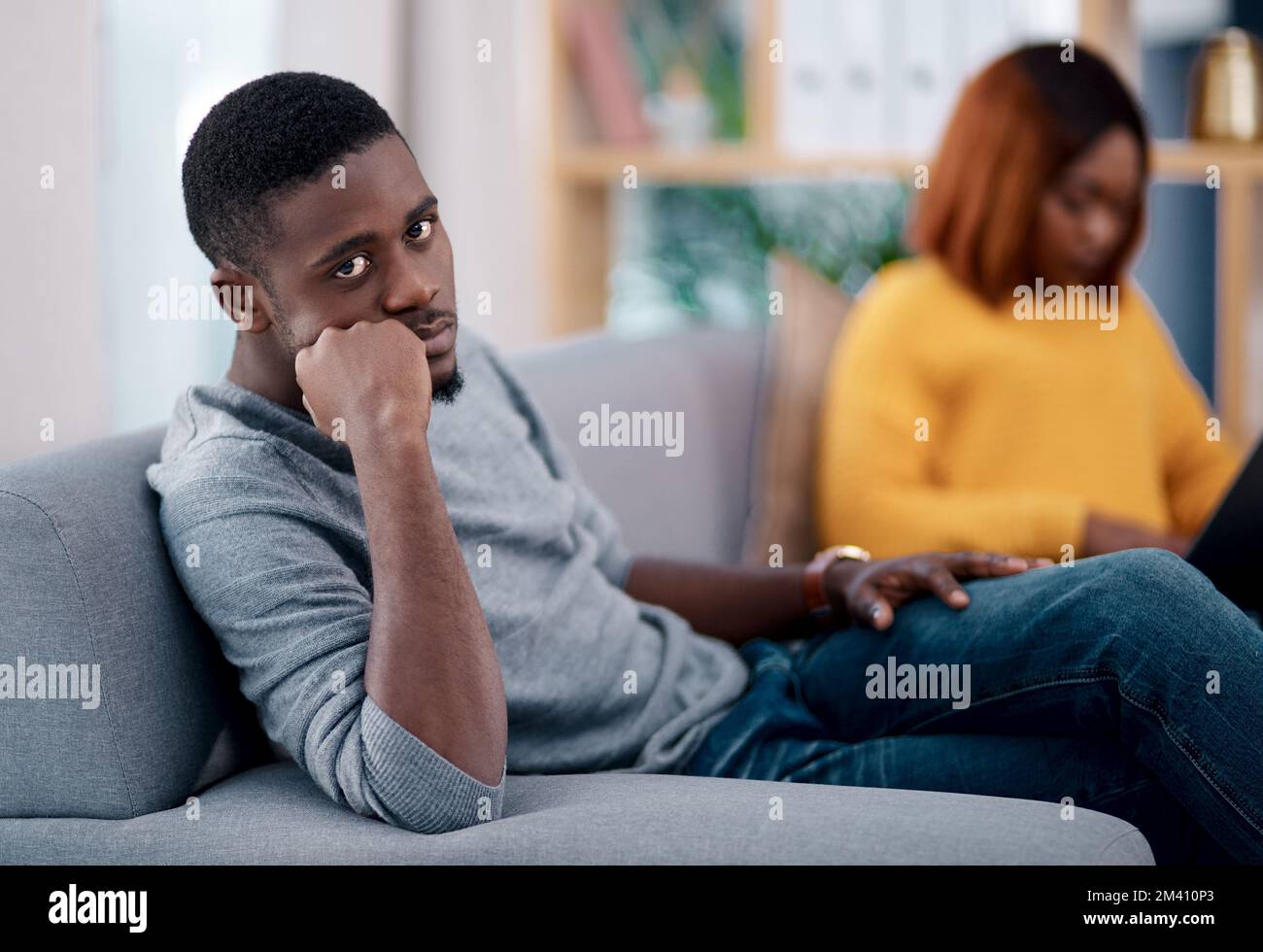 What do I do now. a young man looking annoyed after an argument with ...