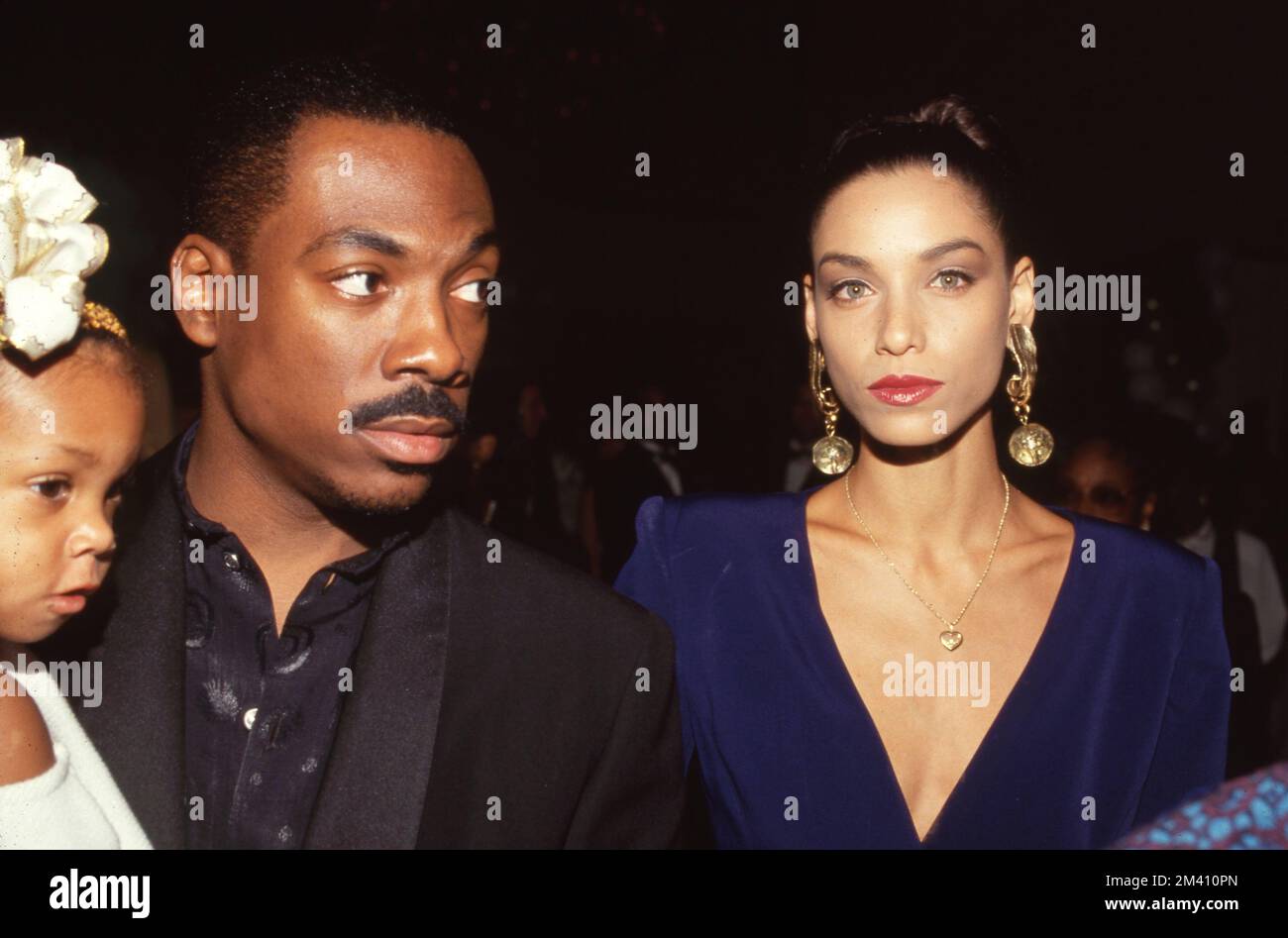 Eddie Murphy with daughter Brea and Nicole Mitchell at the NAACP Salute ...