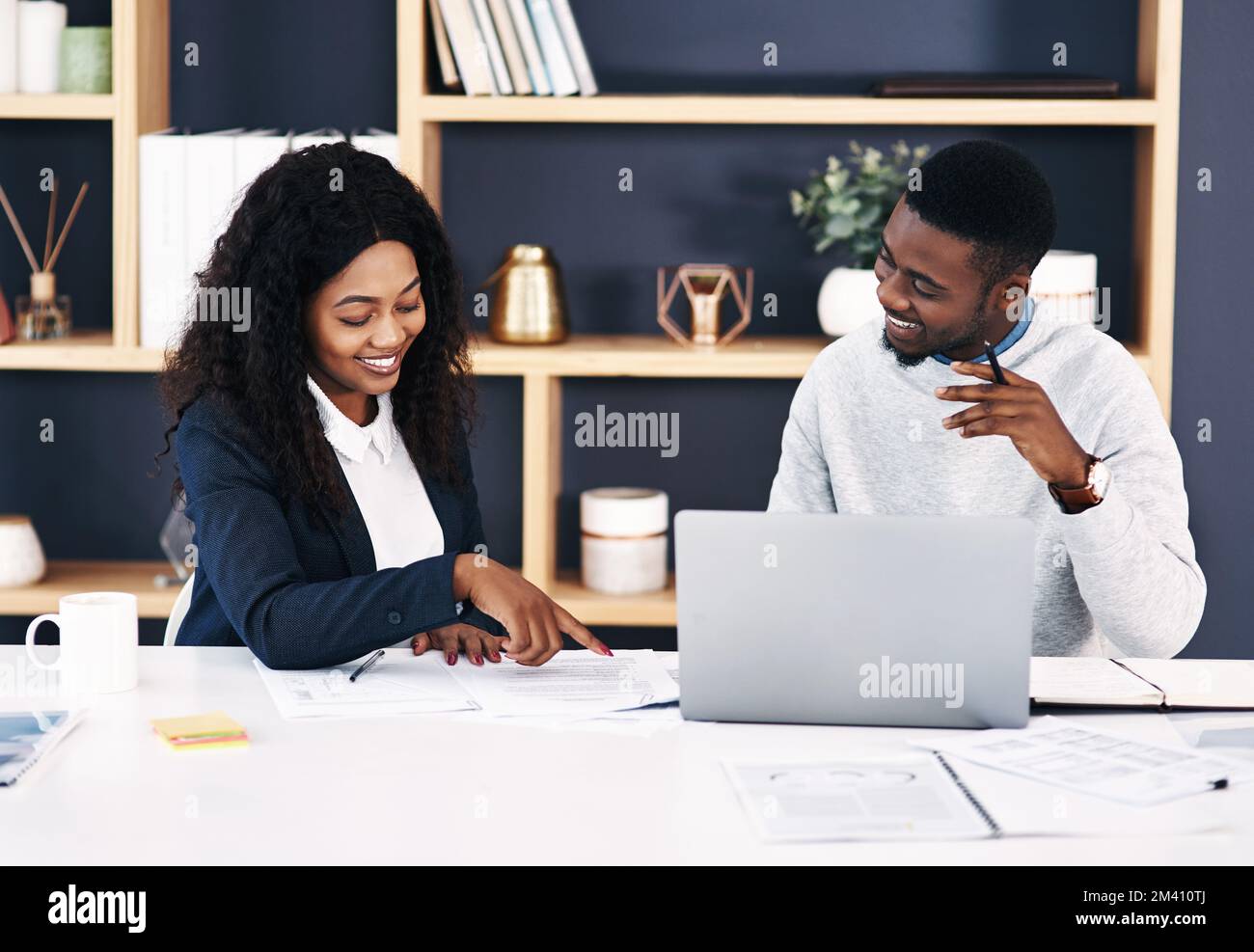 Thos make it happen business moves. a young businessman and ...