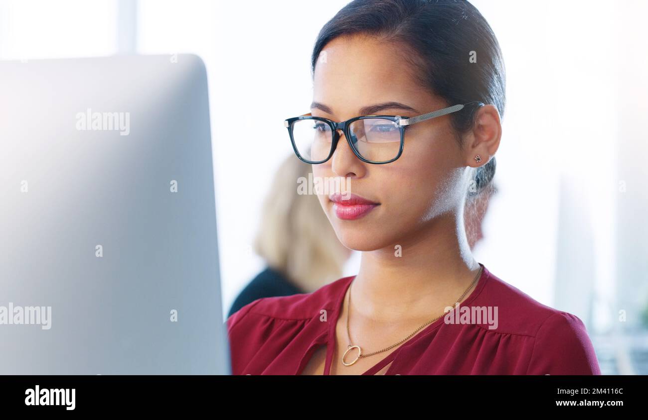Confident to get the job done. a focused young businesswoman working on ...