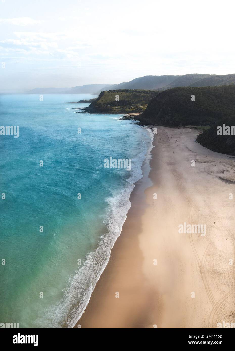 An aerial view of the Garie Beach and coast mountain range in the lower ...