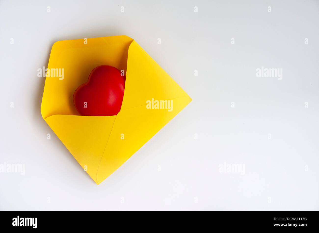 Love letter with heart shape in yellow paper envelope with customizable ...