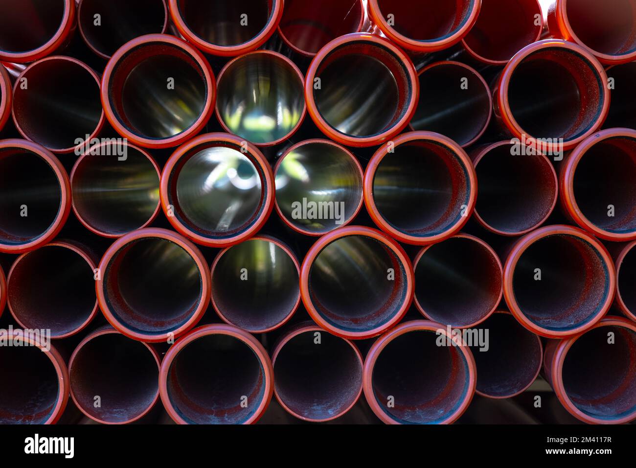 A closeup of pvc pipes on a stack Stock Photo - Alamy