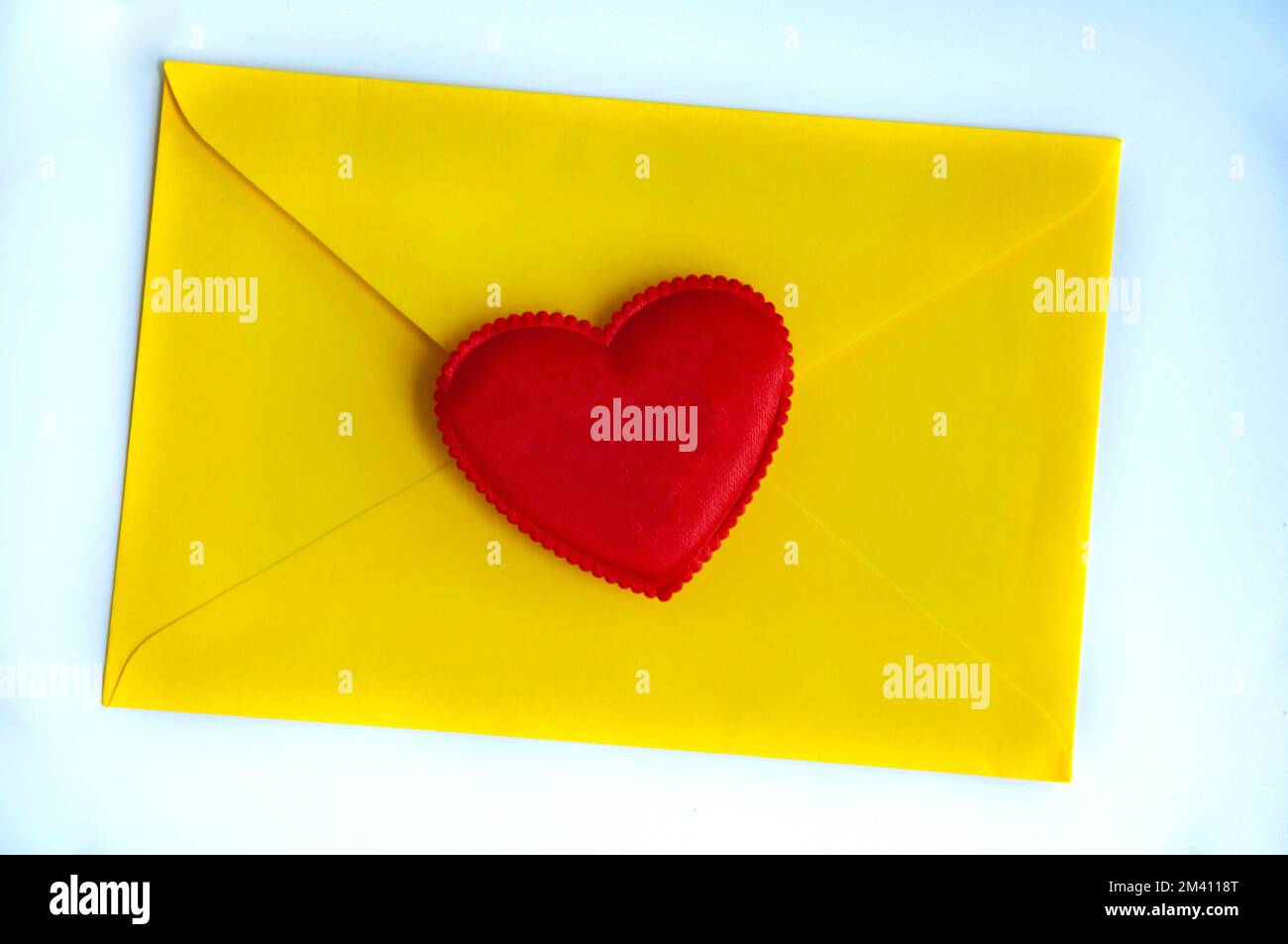 Love letter with heart shape on yellow paper envelope with customizable ...
