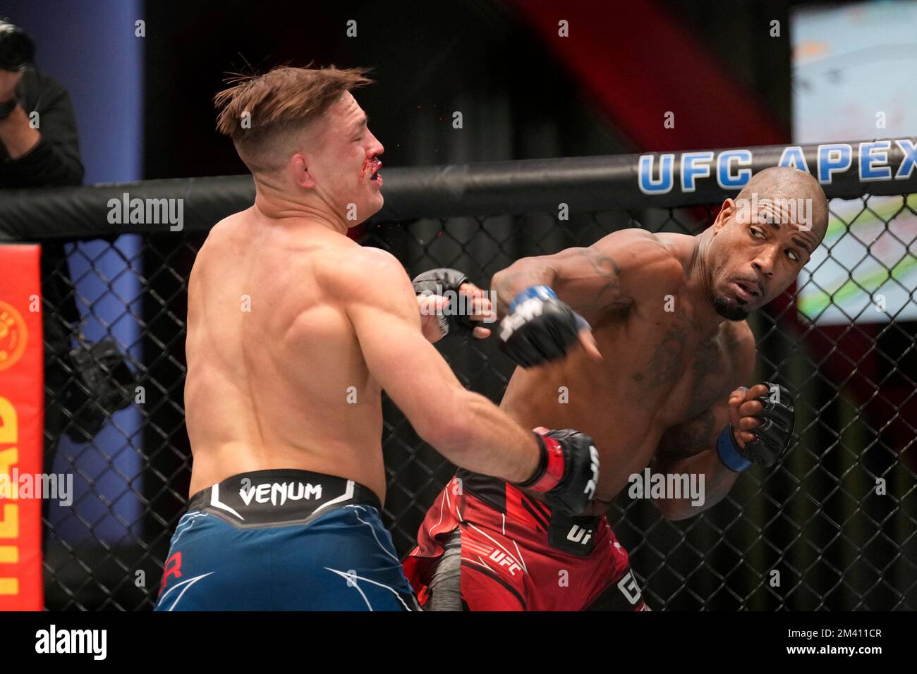 LAS VEGAS, NV - DECEMBER 17: (R-L) Bobby Green punches Drew Dober in ...