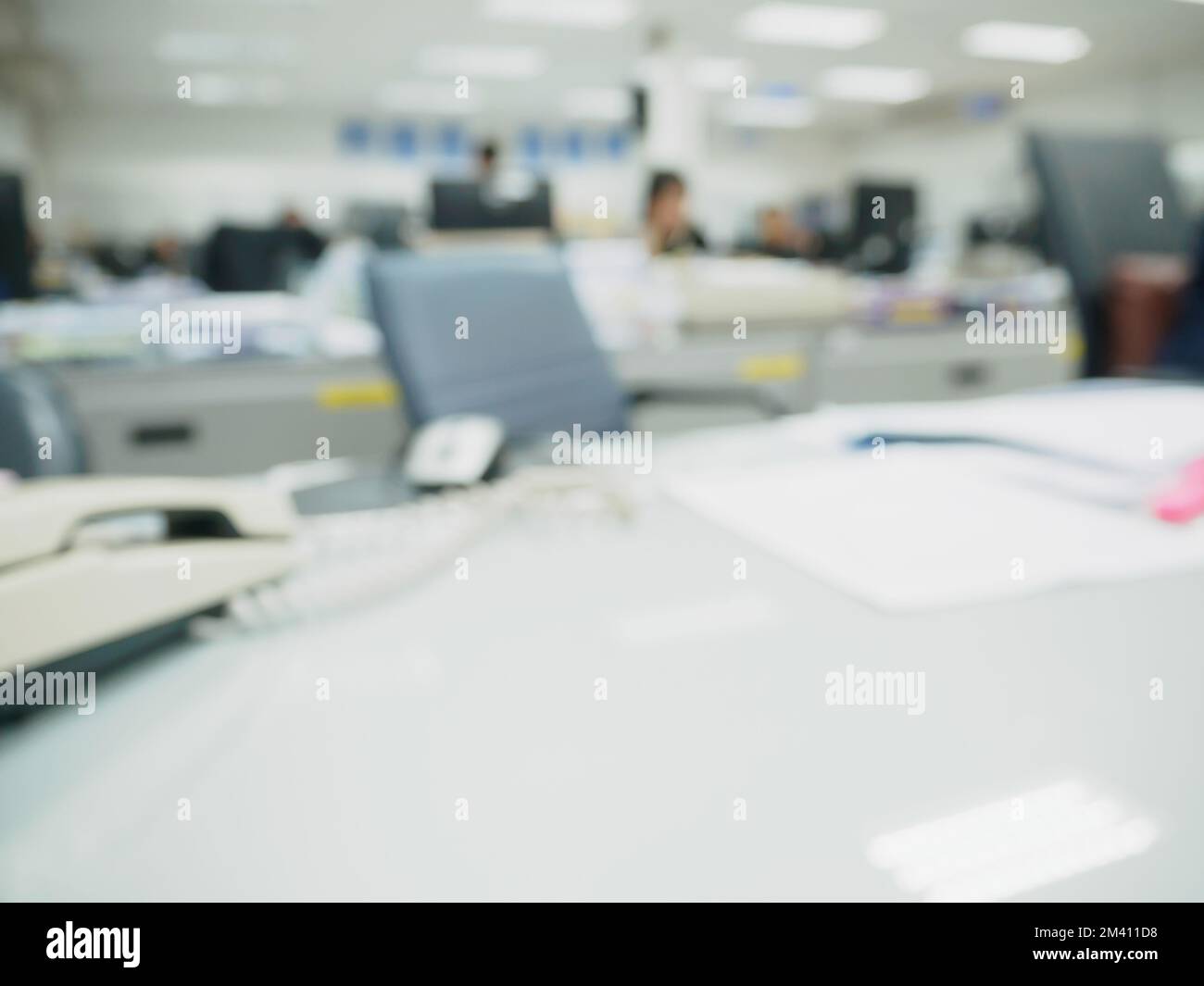 office blurred background with people working at desk Stock Photo - Alamy