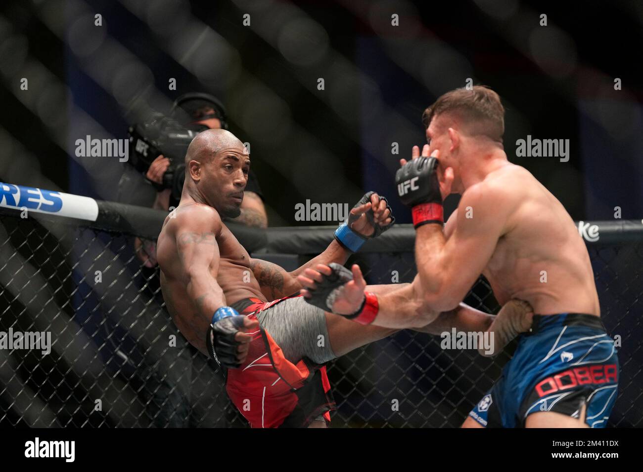 LAS VEGAS, NV - DECEMBER 17: (L-R) Bobby Green kicks Drew Dober in ...