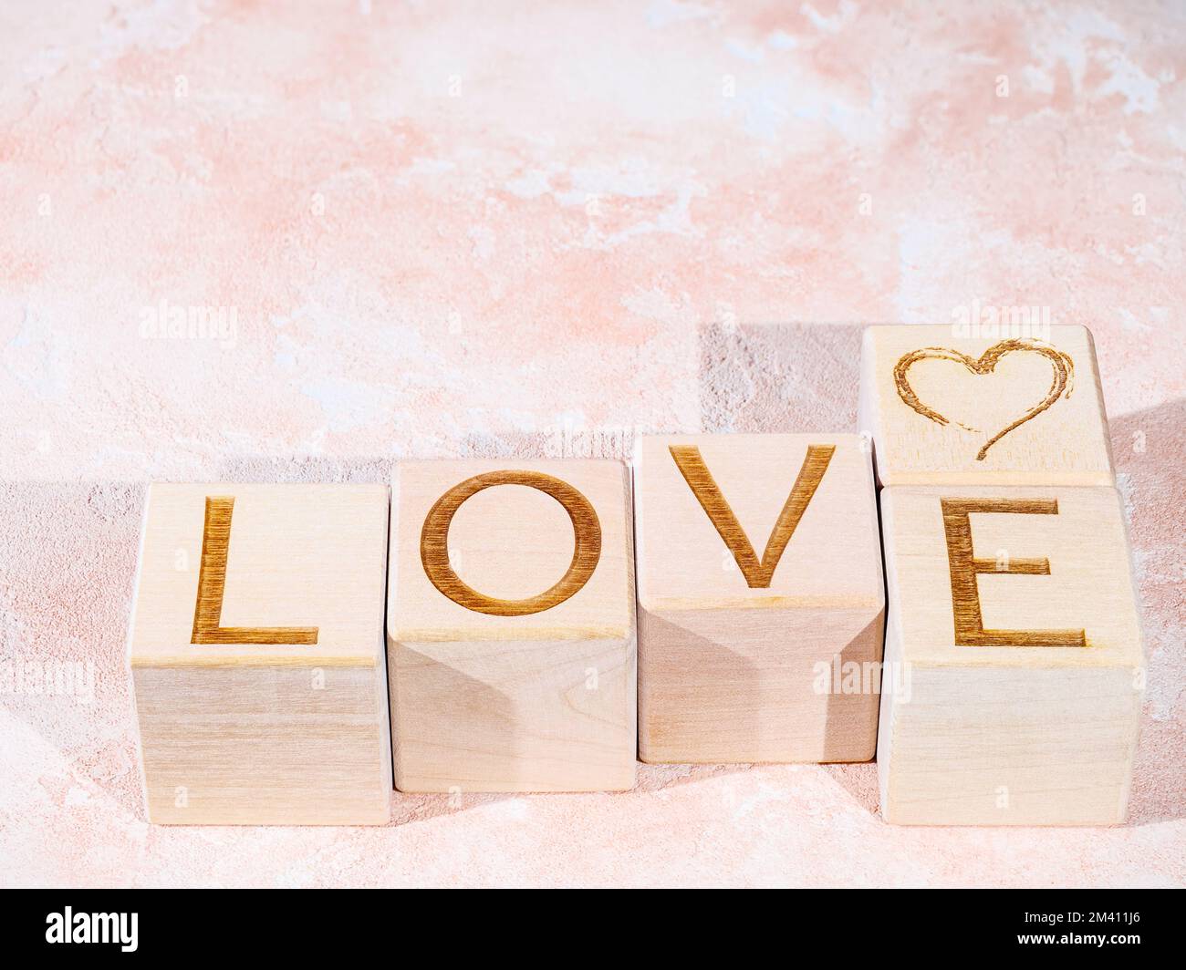 Text LOVE on wooden cubes as concept of declaration of sentiments Stock ...