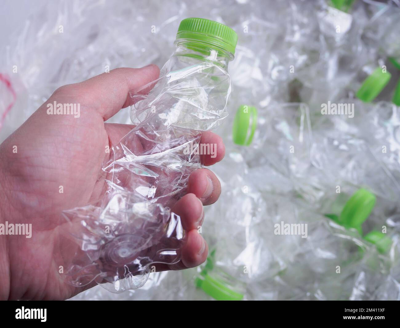 man hand hold plastic bottles, recycle and safe the world from global ...