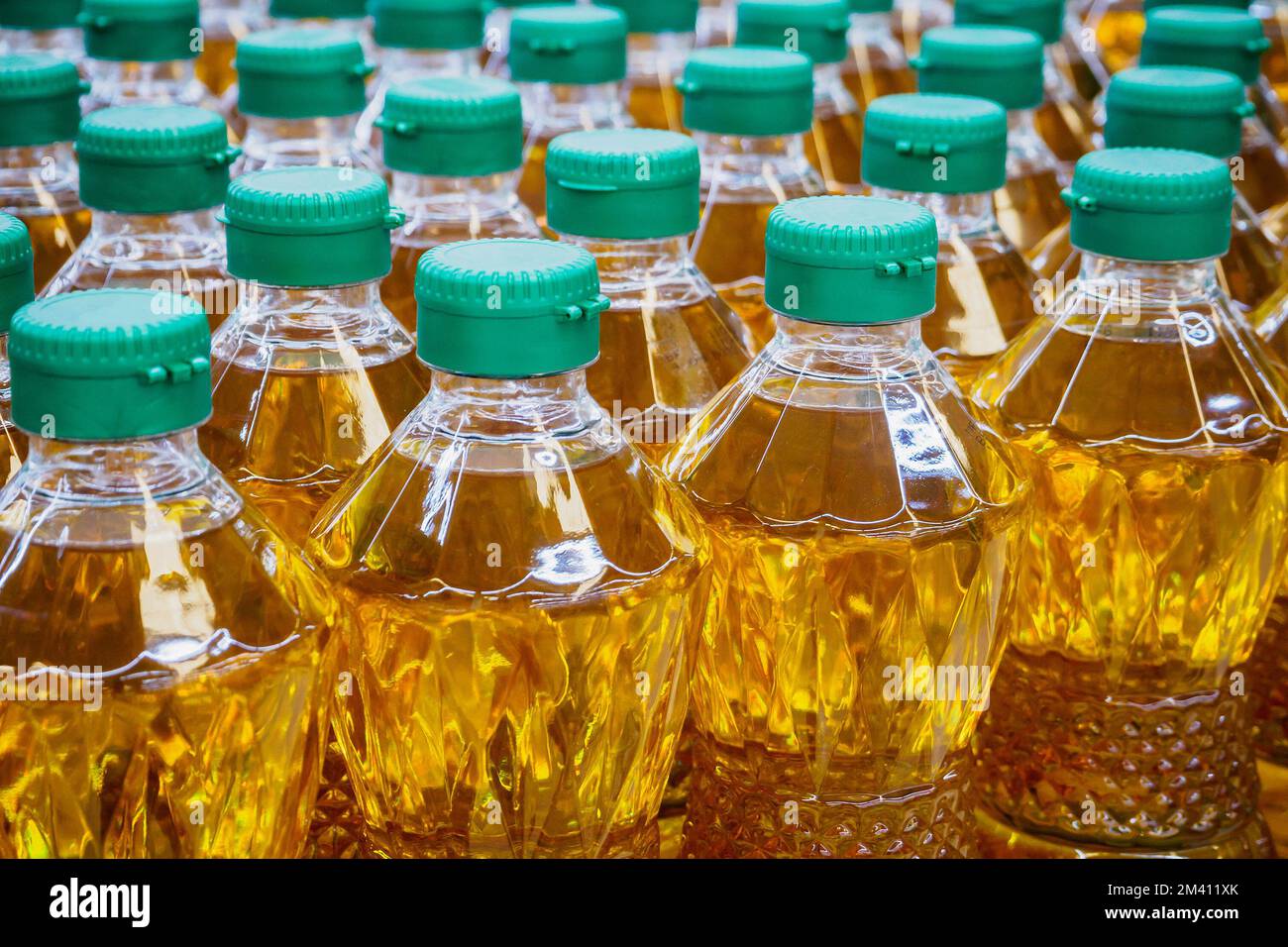 Cooking oil bottles at factory warehouse Stock Photo - Alamy