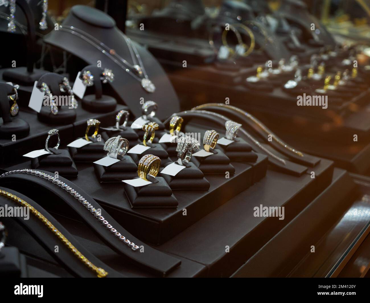 Gold jewelry diamond shop with rings and necklaces luxury retail store ...