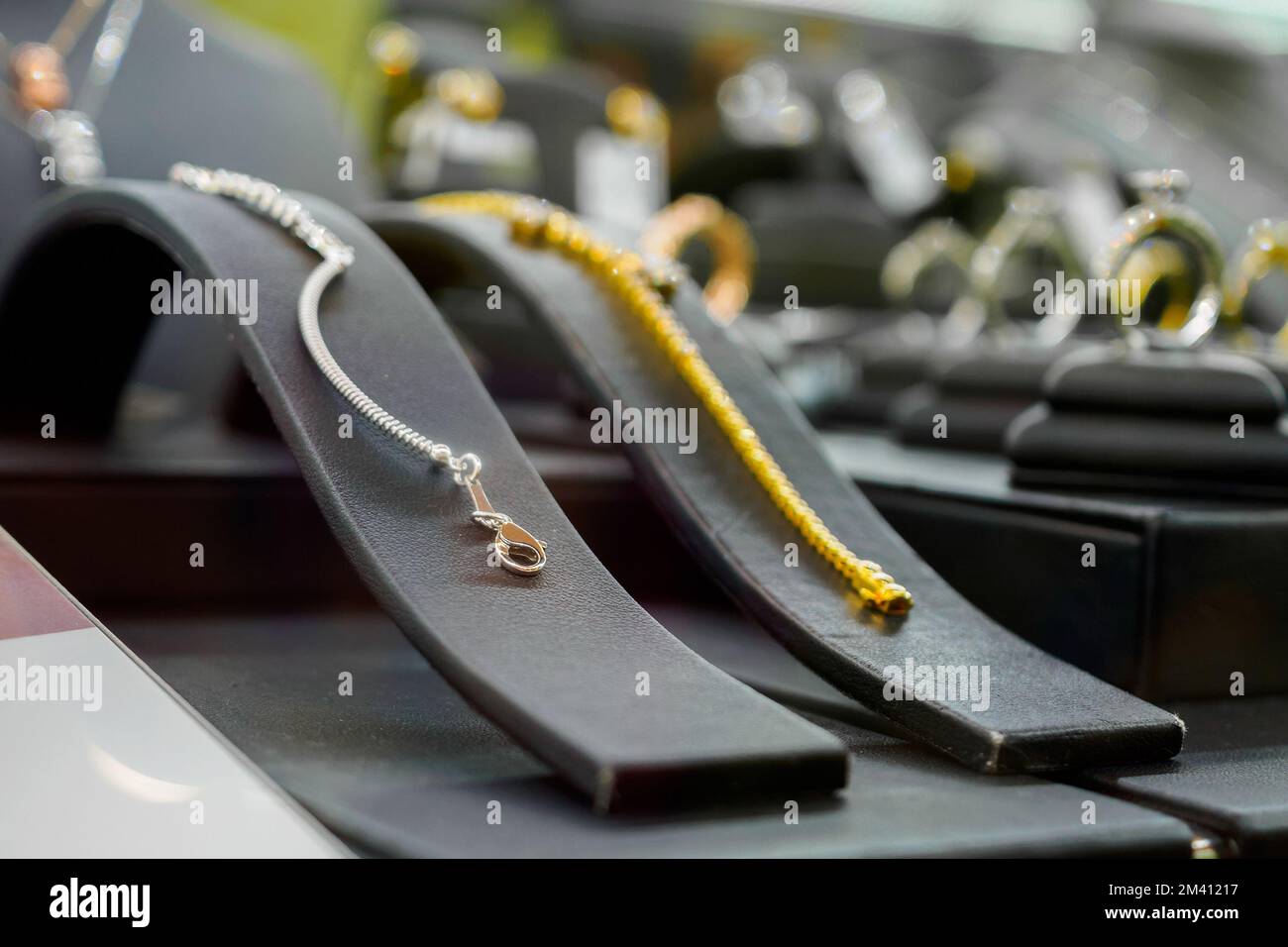 Gold jewelry diamond shop with bracelet rings and necklaces in luxury ...