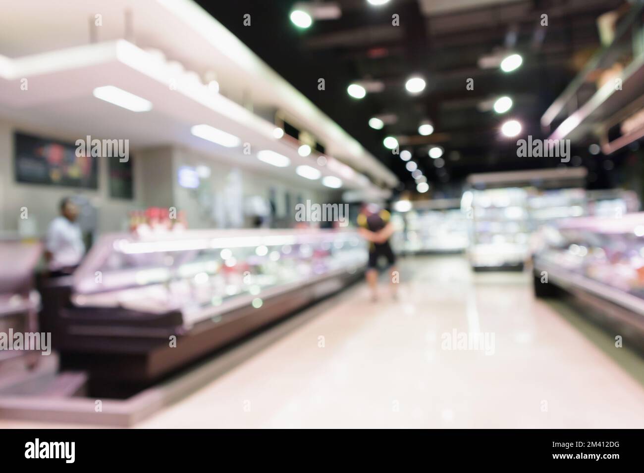 Abstract supermarket grocery store blurred defocused background with ...