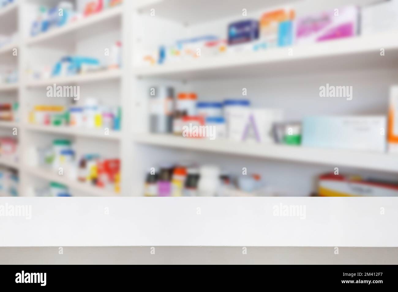 Pharmacy drugstore counter table with blur abstract backbround with ...
