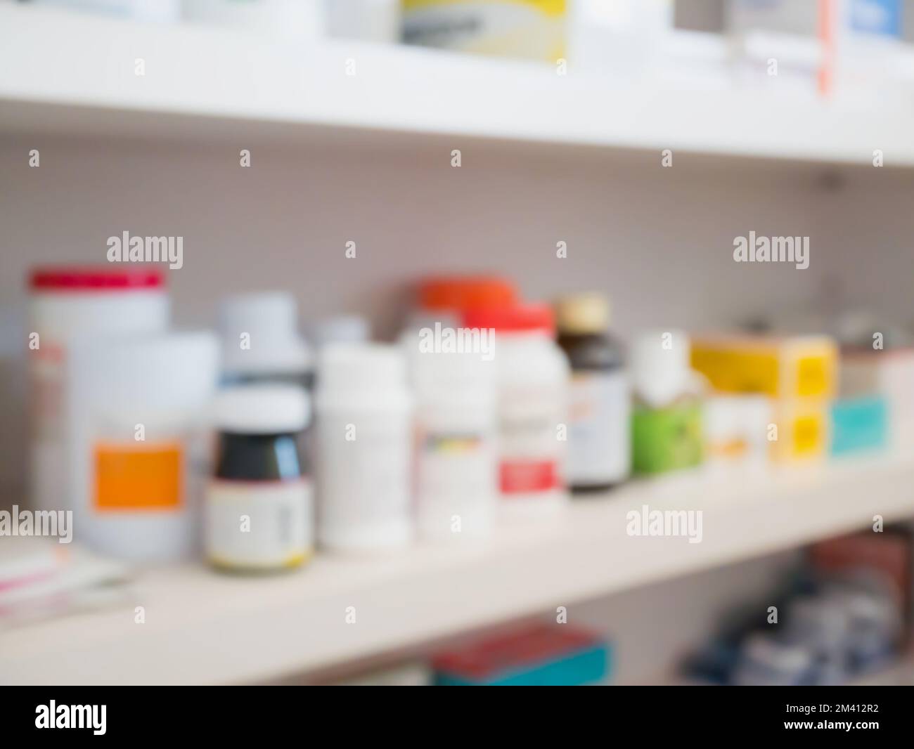 Close up of medicine bottles on shelves of drugs in the pharmacy store ...