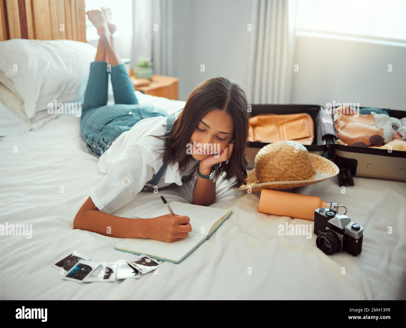 Woman writing diary bed hi-res stock photography and images - Alamy