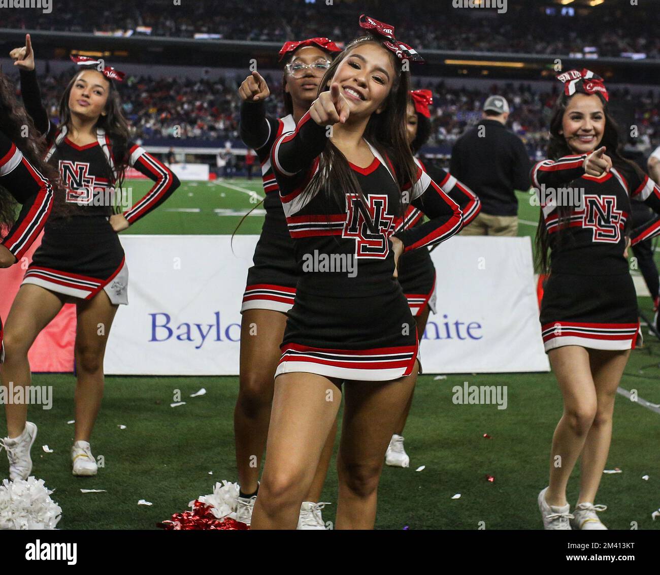 Dallas, TX, USA. 17th Dec, 2022. A North Shore cheerleader finishes a ...