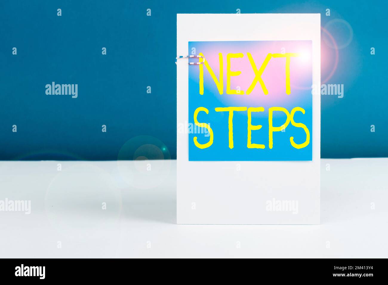 Sign displaying Next Steps. Conceptual photo numper of process going to ...