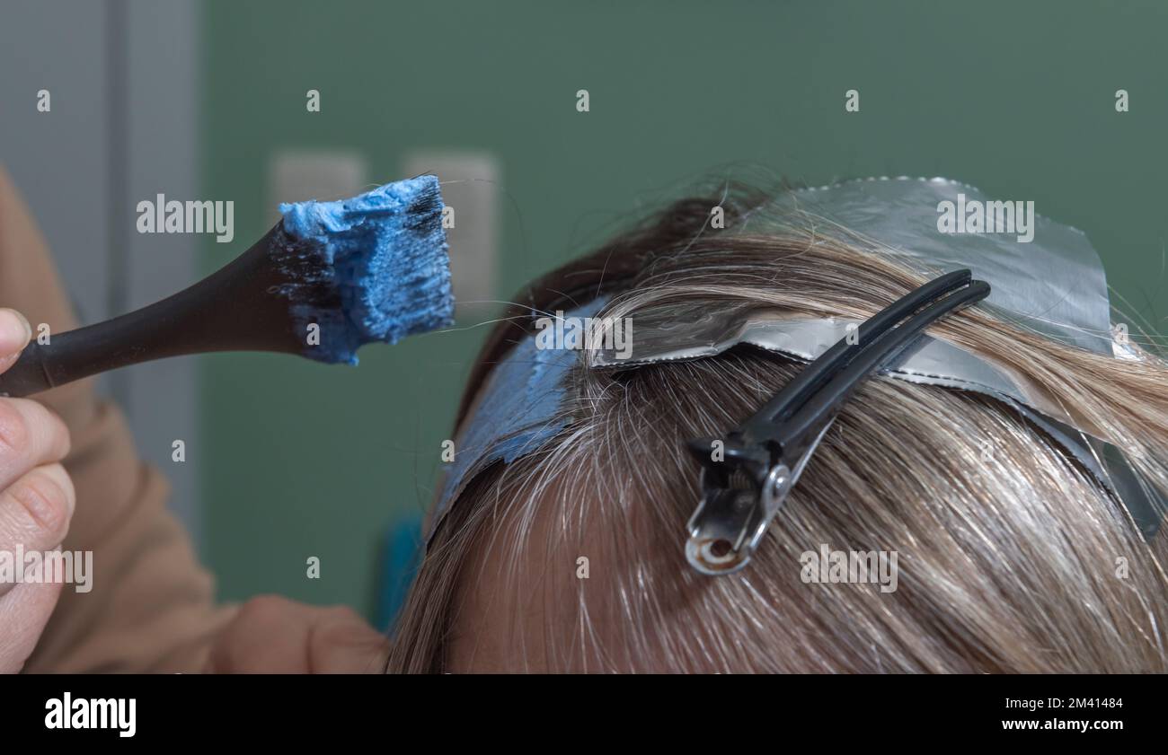 hair coloring process with the brush. hair texture. close-up Stock ...