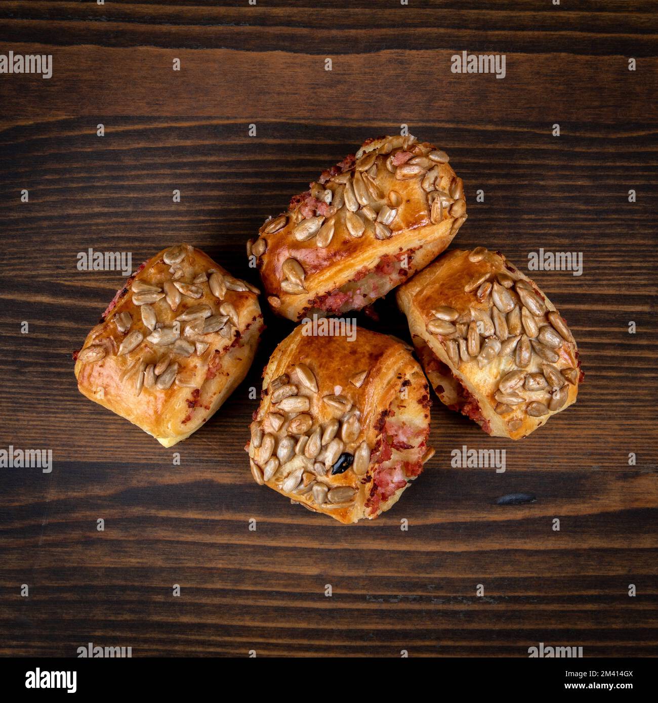 Meat patties with seeds. Wood texture background Stock Photo - Alamy