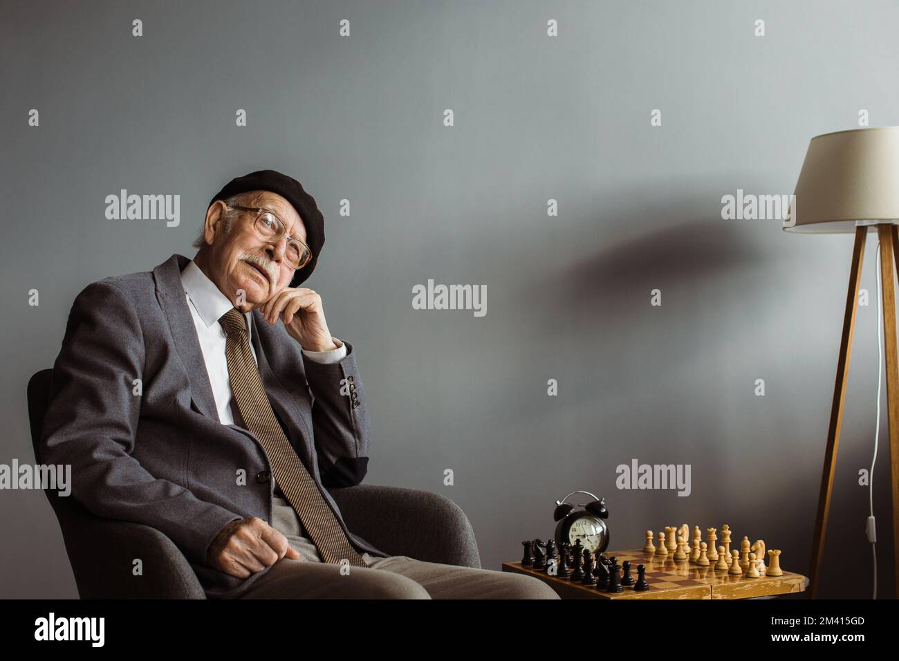 An old man plays chess Stock Photo - Alamy