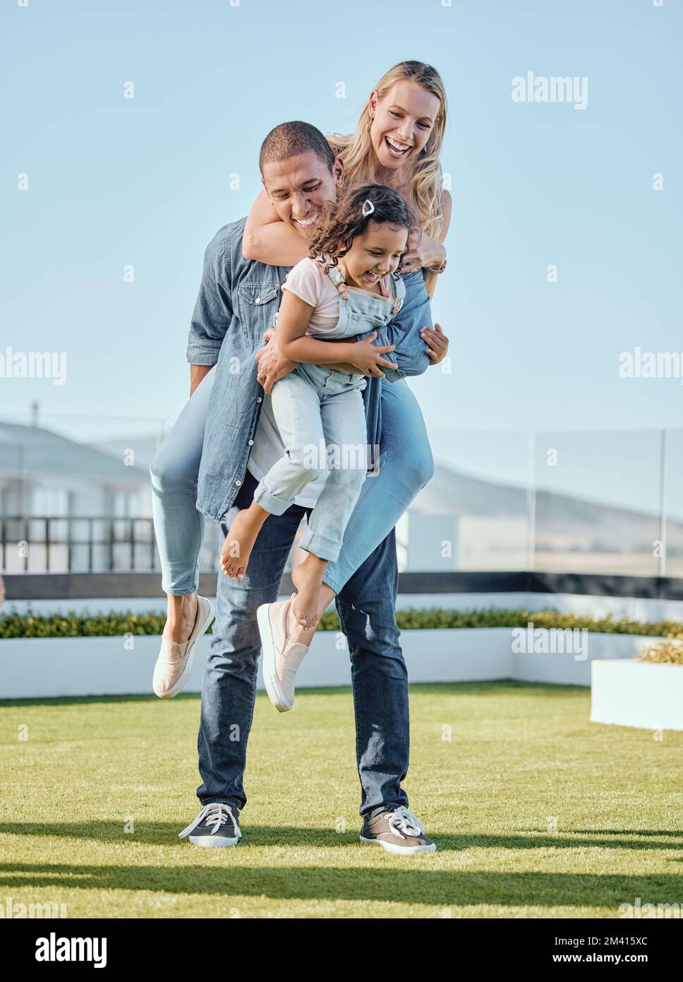 Family, happy and playful together outdoor for love, support and ...