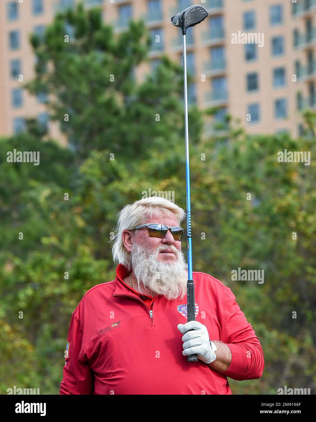 John Daly watches his ball after teeing off on the tenth hole during ...