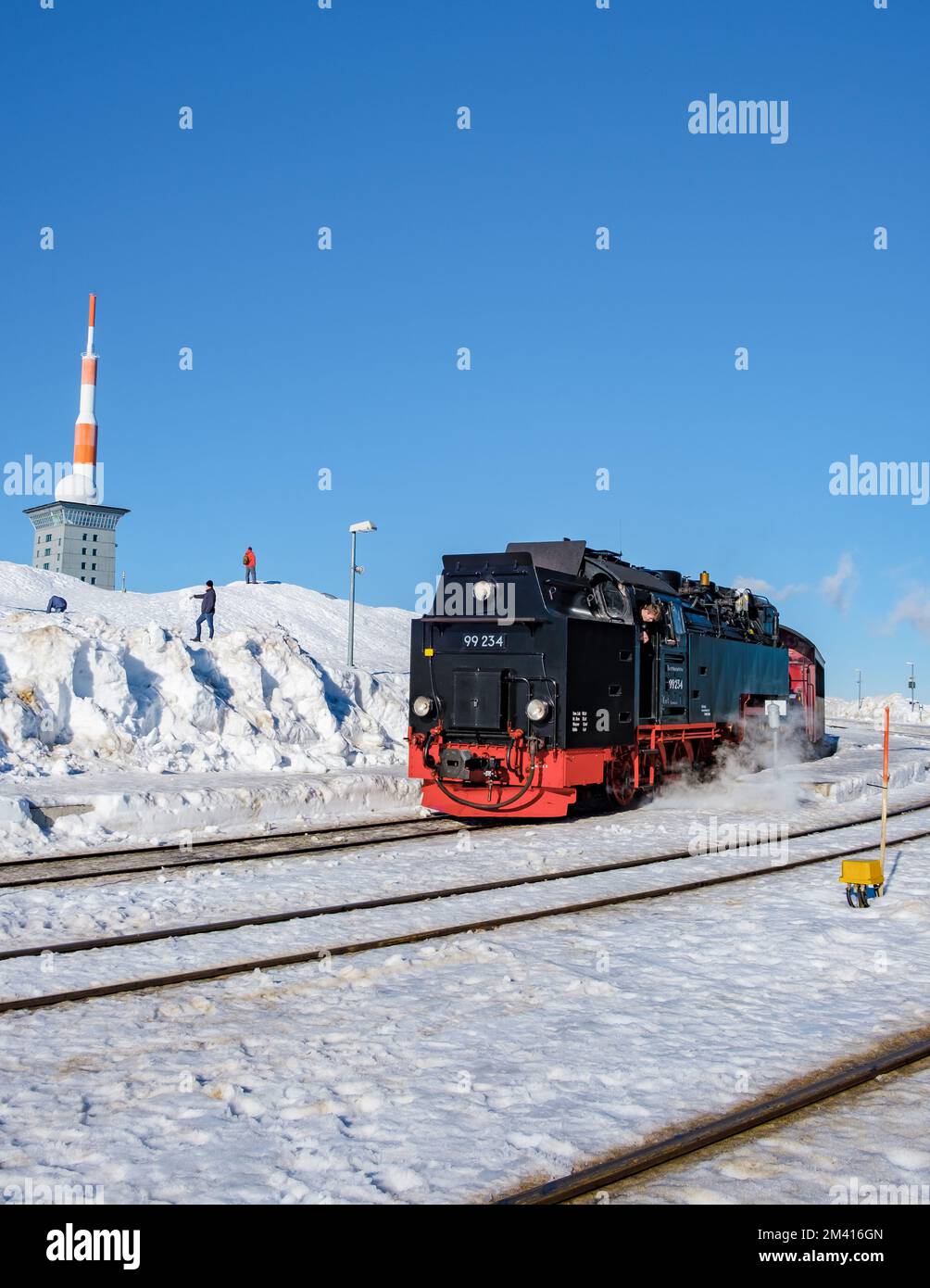 Steam train during winter in the snow in the Harz national park Germany ...