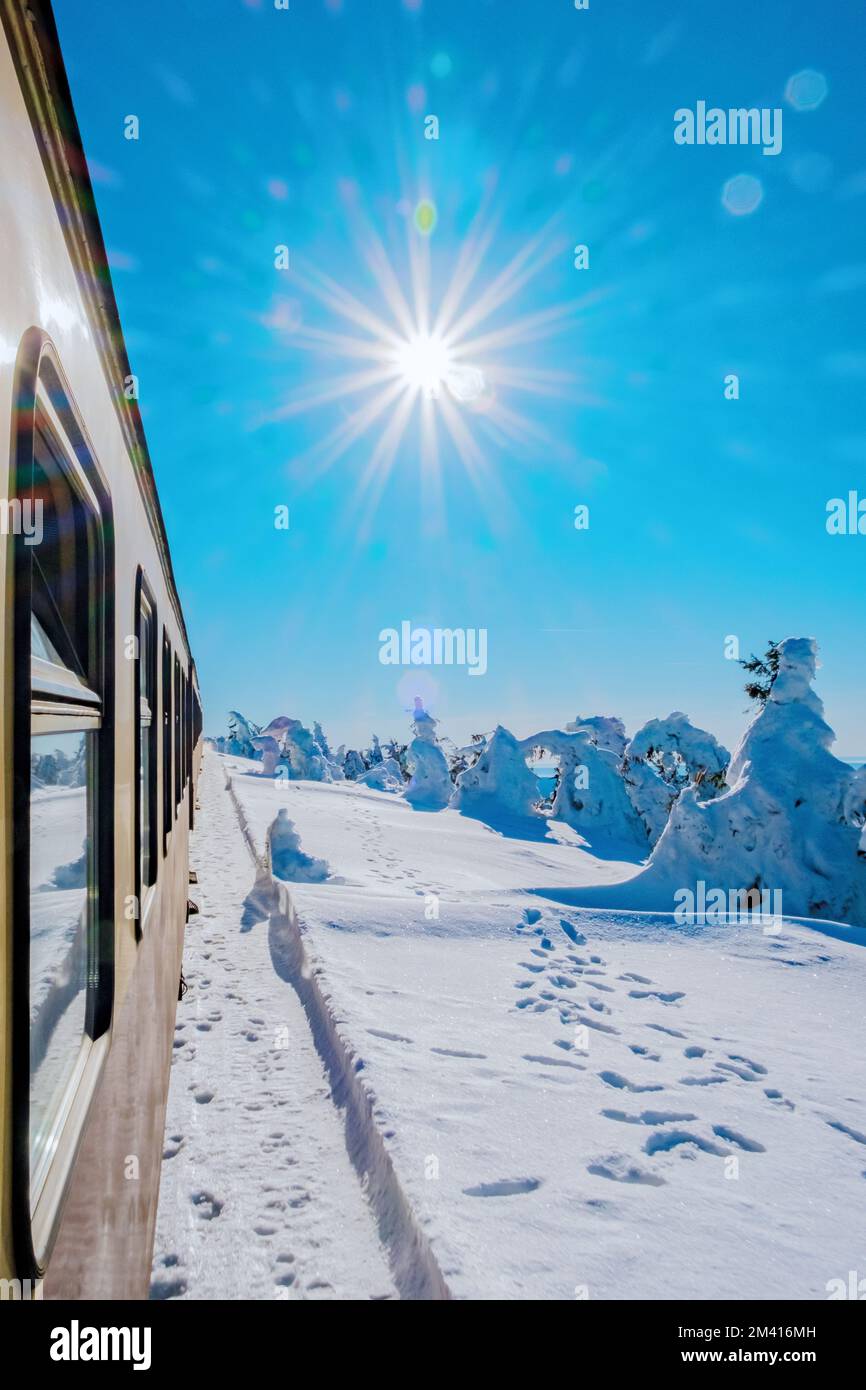 Steam train during winter in the snow in the Harz national park Germany ...