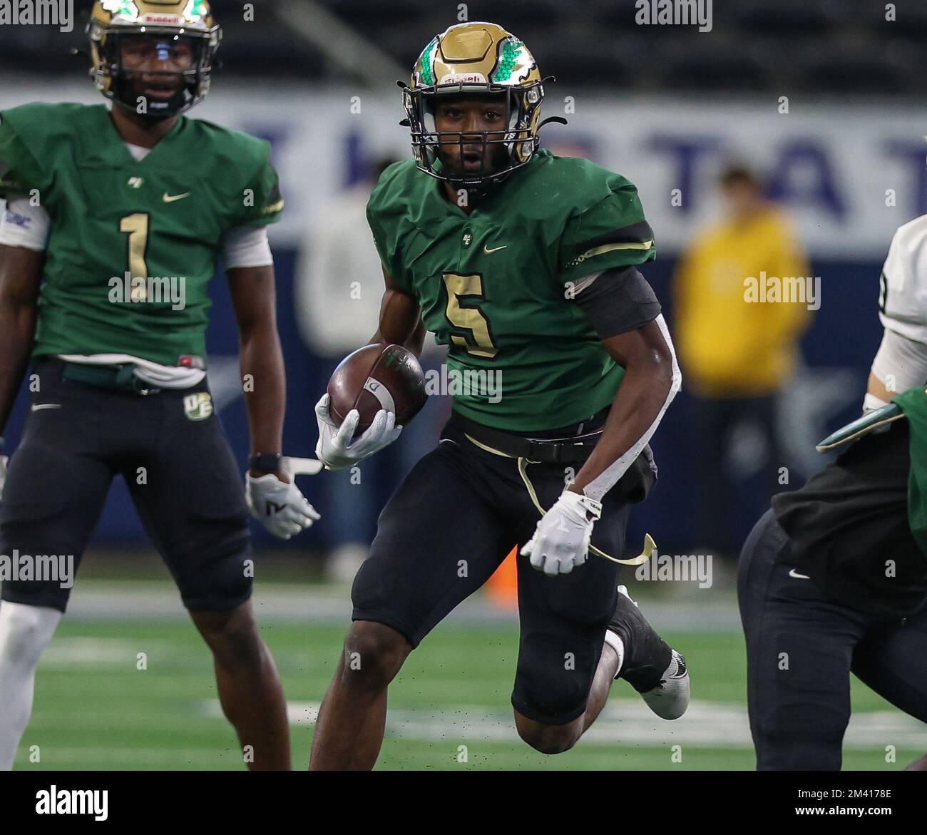Dallas, TX, USA. 17th Dec, 2022. DeSoto's Tre Wisner #5 breaks free for ...