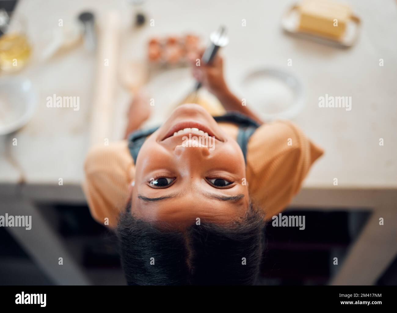 Cooking, kitchen and face portrait of kid baking dessert, food or ...