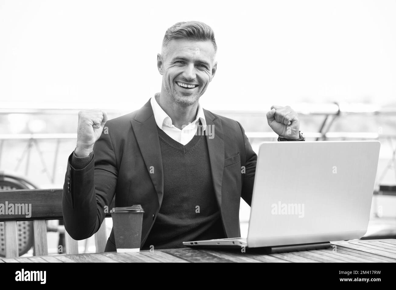 You can win. Happy businessman make winning gesture. Professional man ...