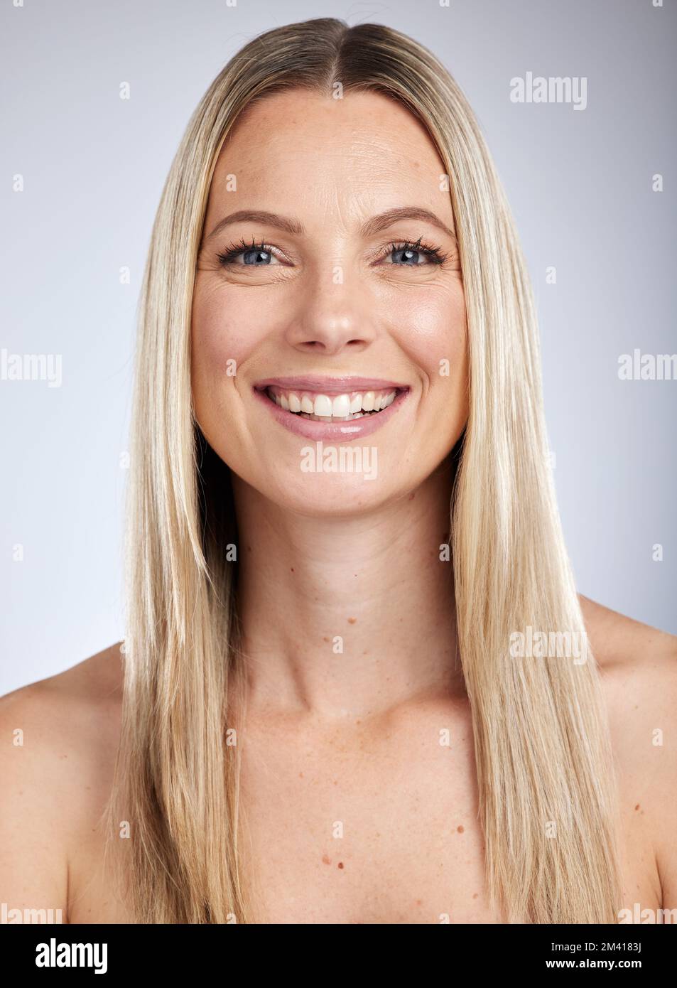 Face portrait, makeup and skincare of woman isolated on a gray studio ...